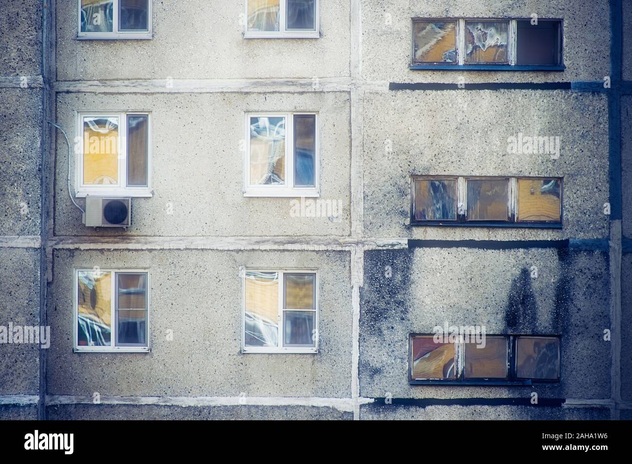 Gray facade of old multi-storey residential building from USSR times in ...