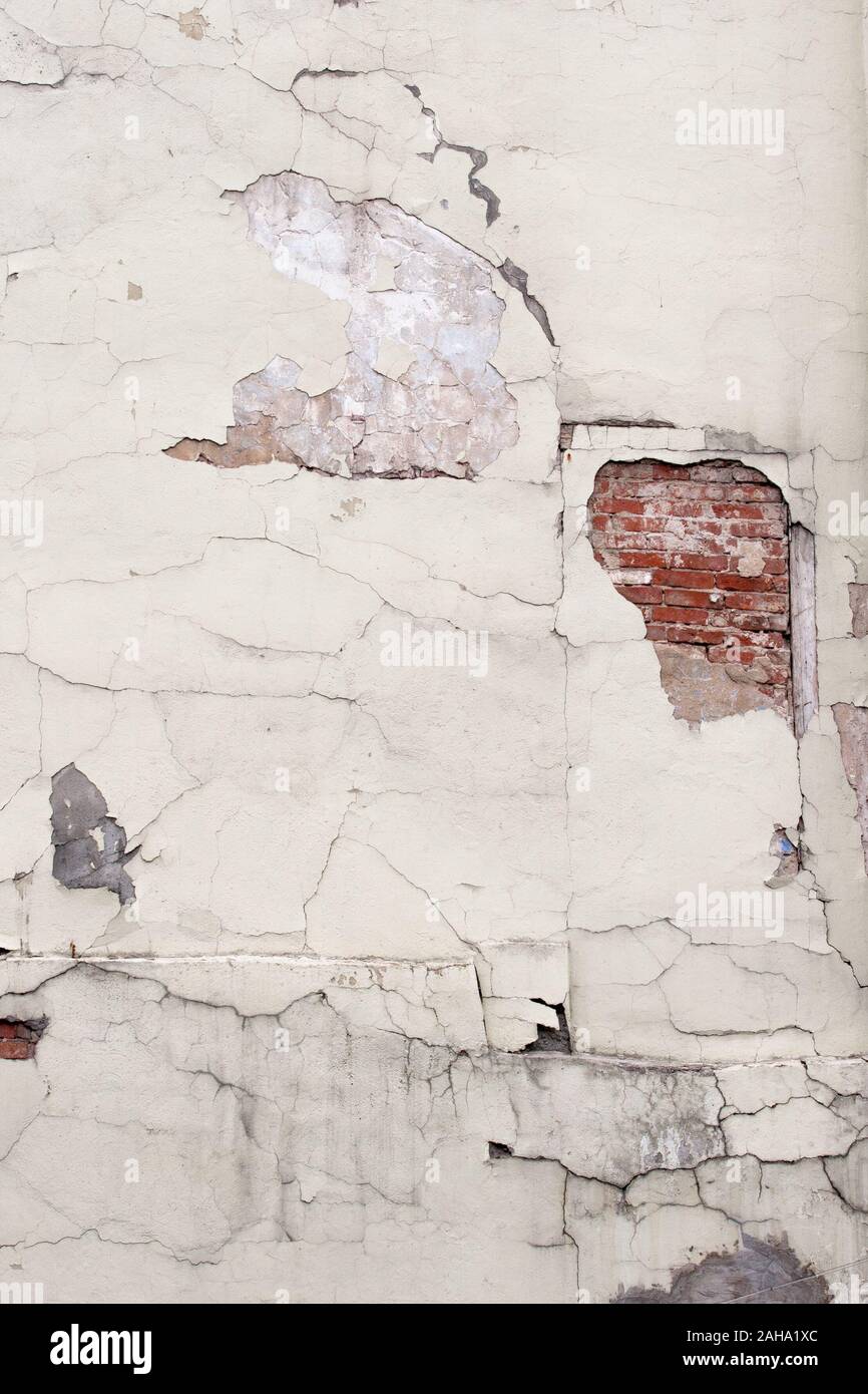 Old brick wall with peeling stucco as a background or texture Stock ...