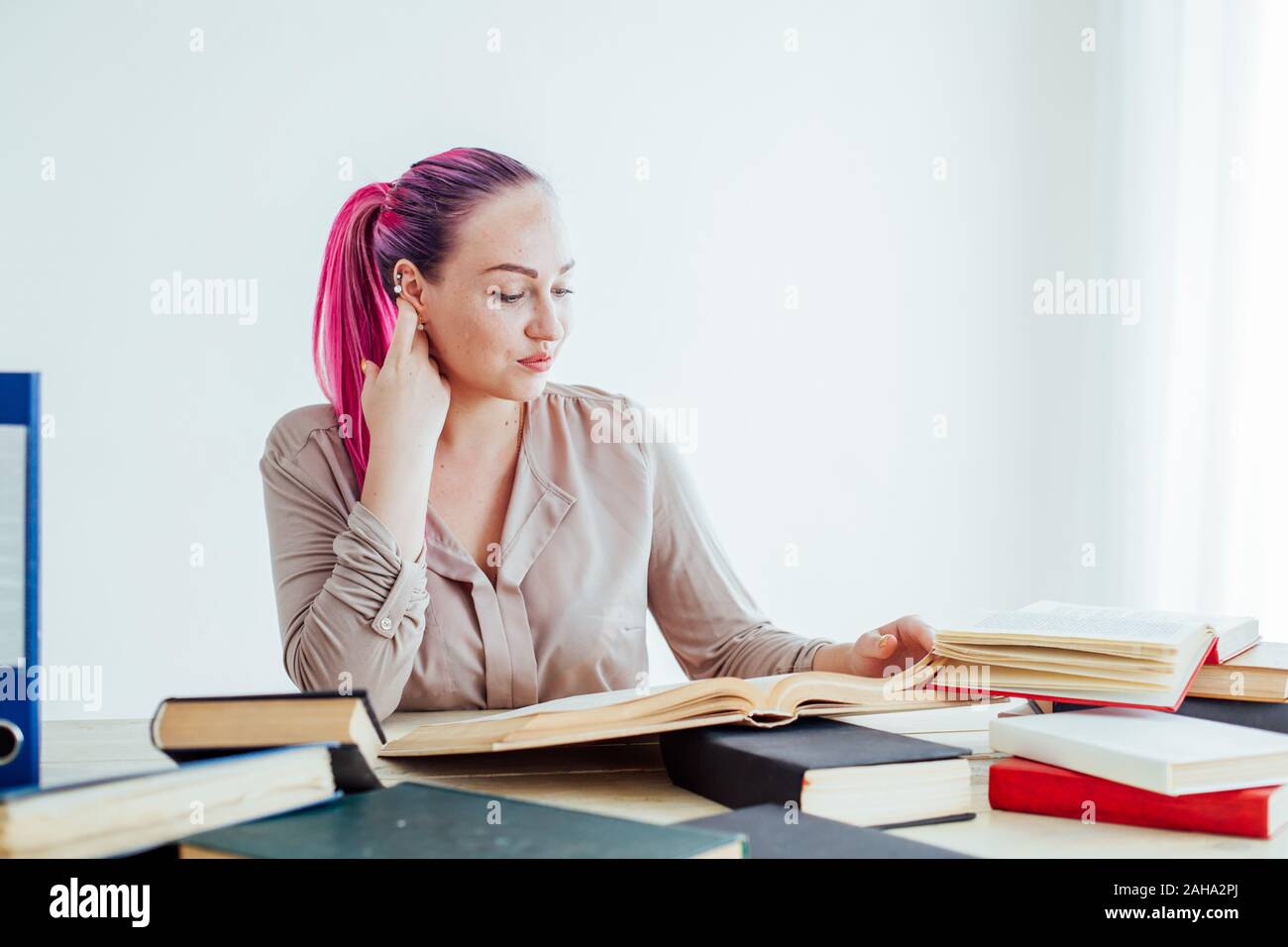 business woman with pink hair Secretary works in an Office paper ...