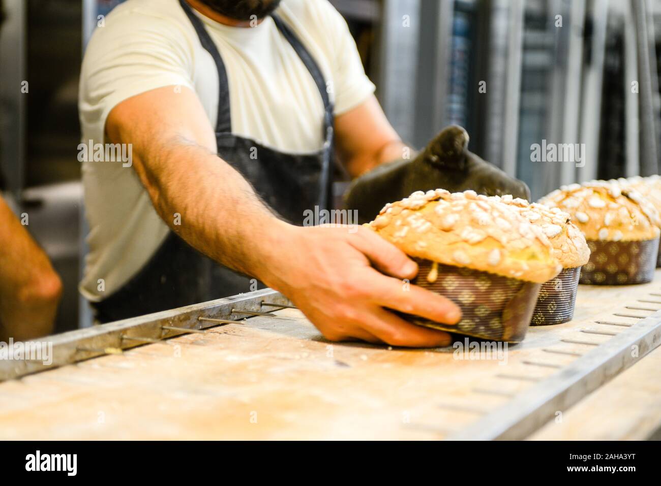 Italian pastry chef Baking Panettone sweet italian cake Stock Photo - Alamy