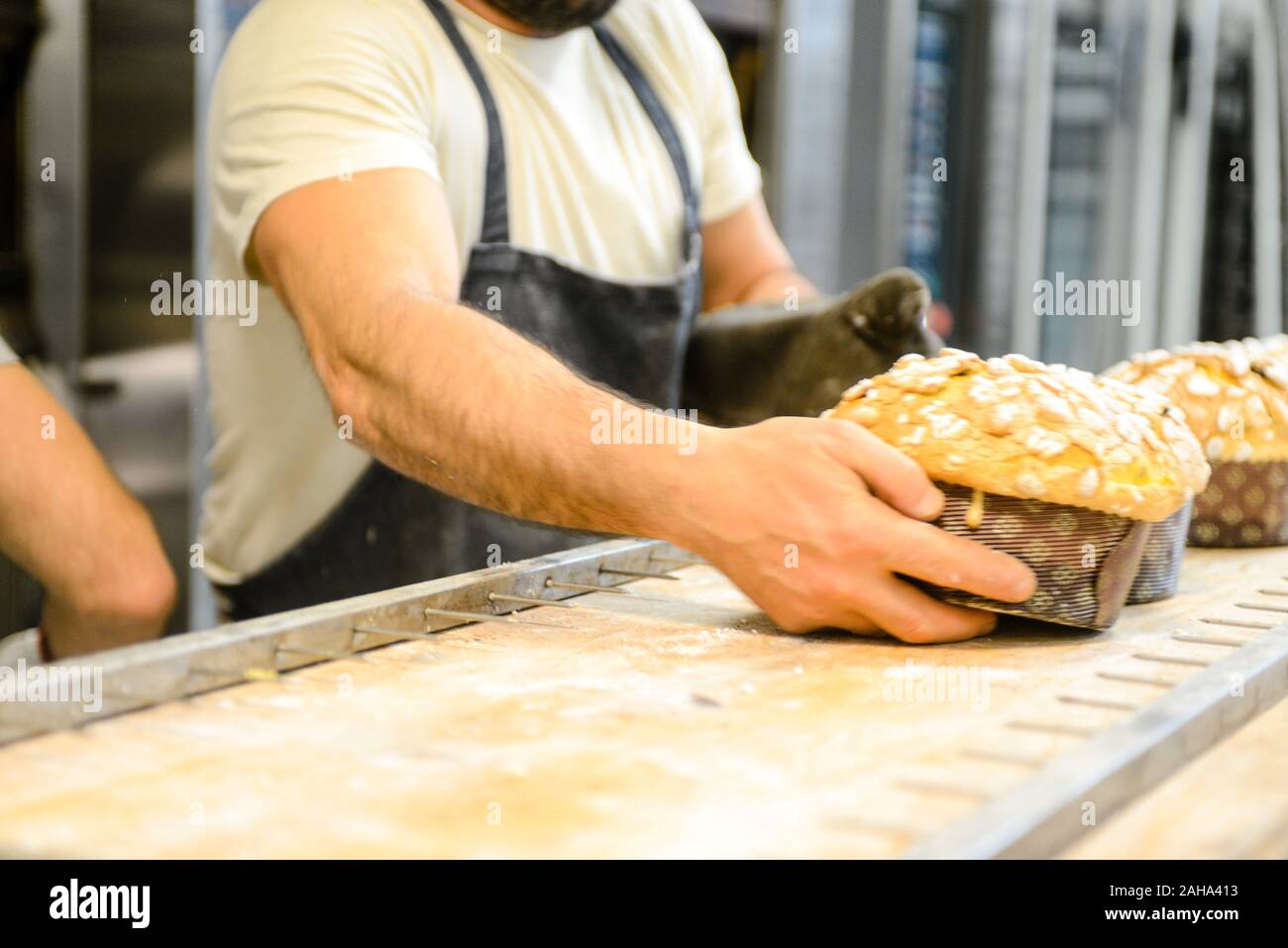 Italian pastry chef Baking Panettone sweet italian cake Stock Photo - Alamy