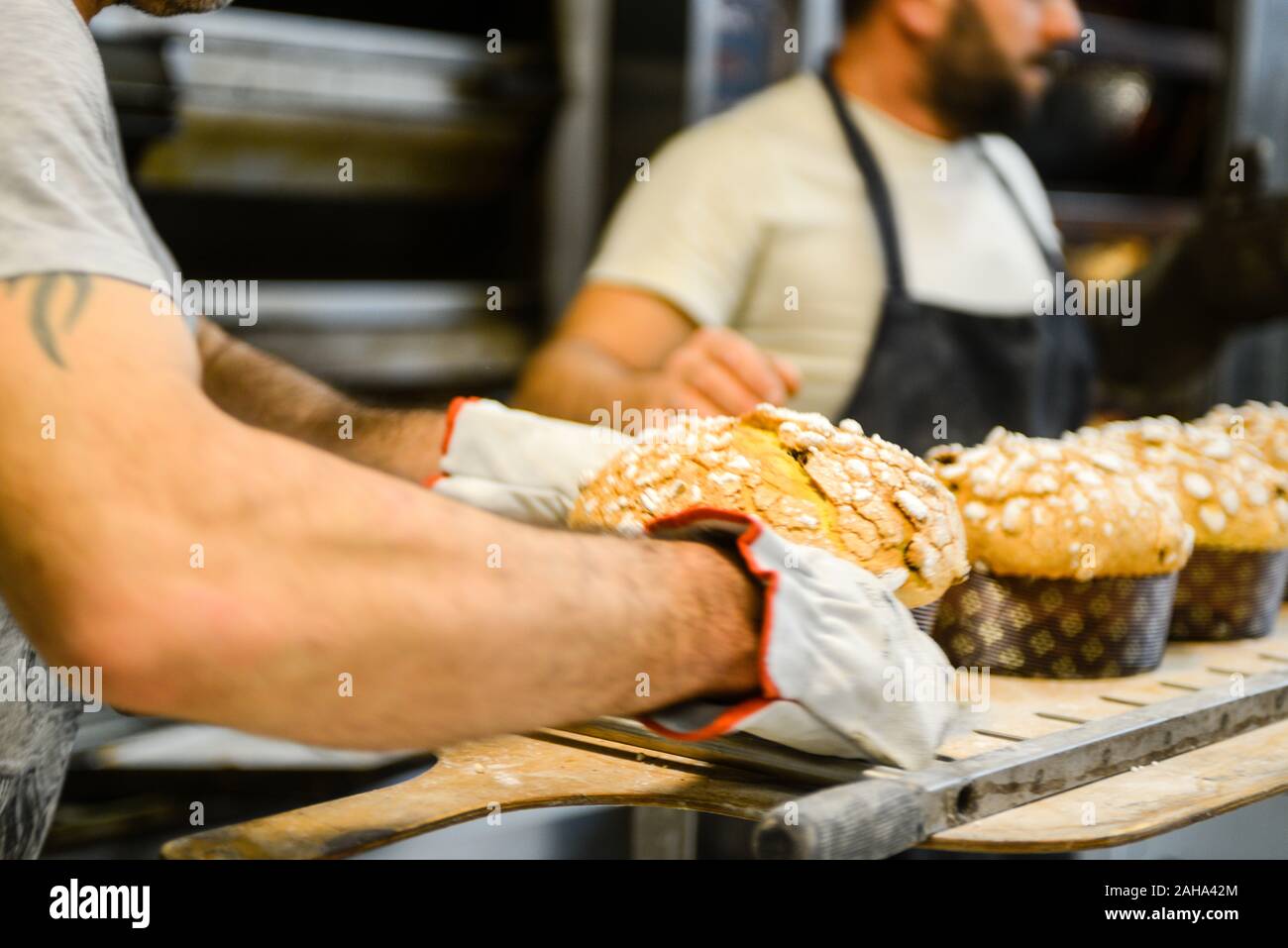 Italian pastry chef Baking Panettone sweet italian cake Stock Photo - Alamy