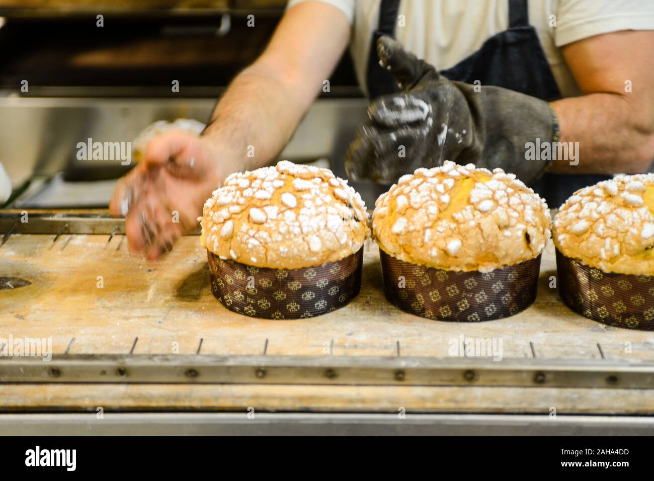 Italian pastry chef Baking Panettone sweet italian cake Stock Photo - Alamy