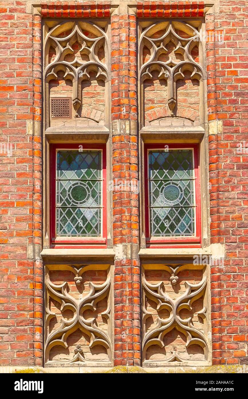 Windows of traditional medieval brick house exterior in belgian ...