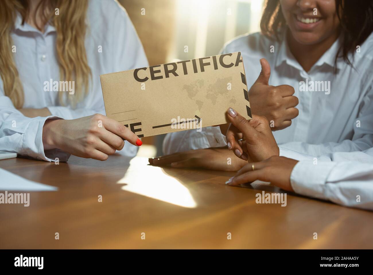 Person holding certificate white hi-res stock photography and images ...