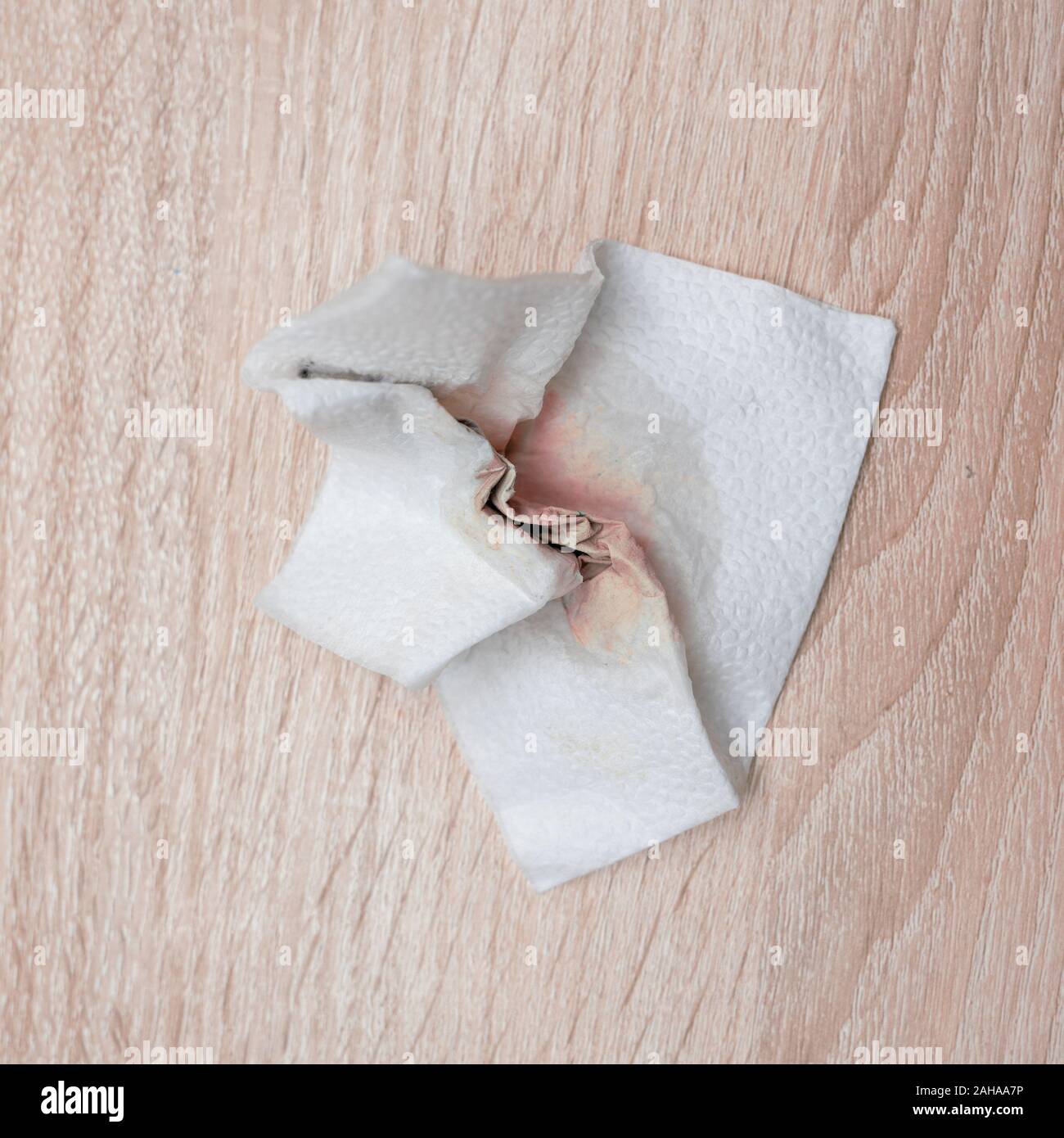 White dirty napkin on wood table. stained crumpled tissue paper Stock ...