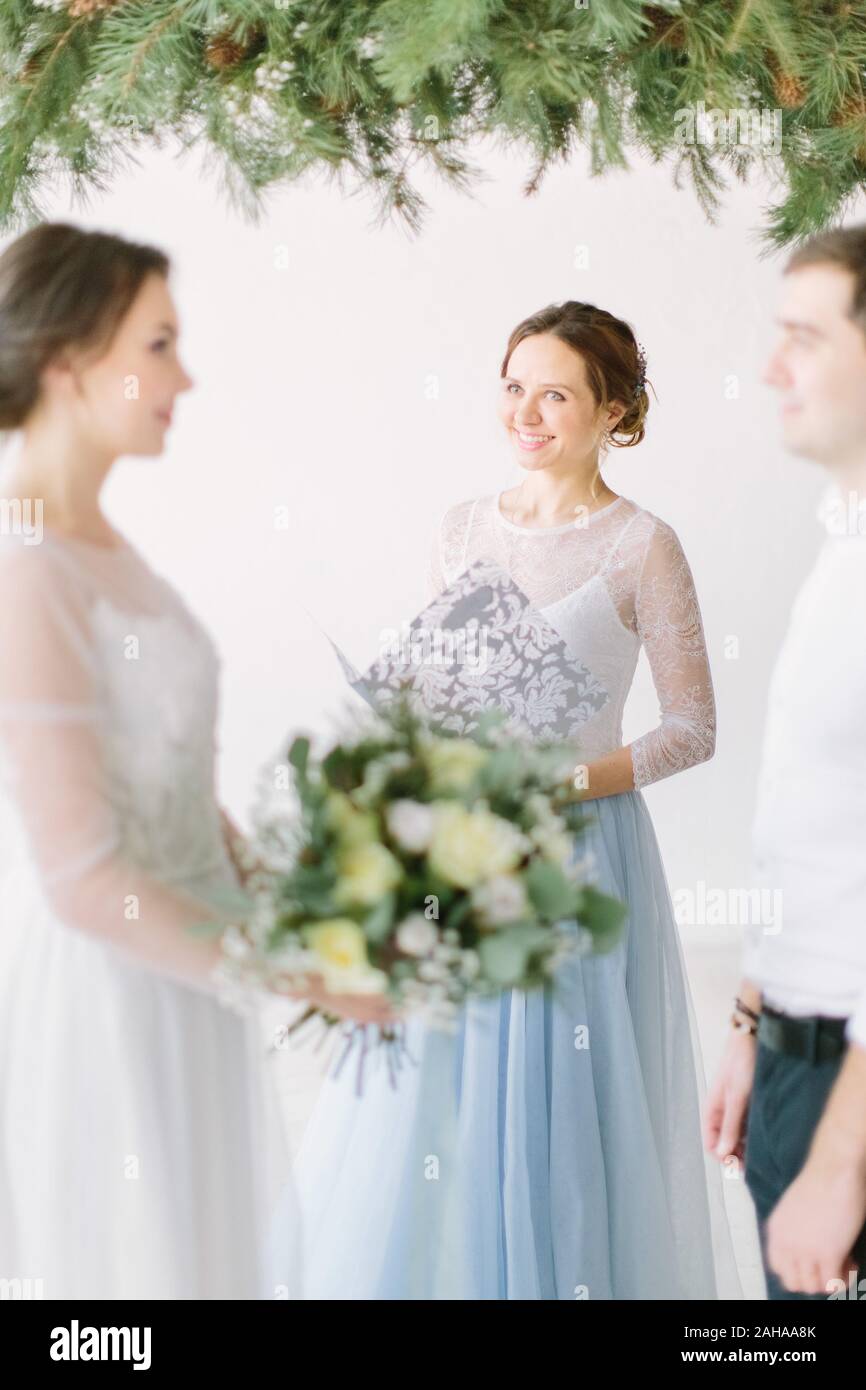 Couple Getting Married at an Indoor Wedding Ceremony Stock Photo - Alamy