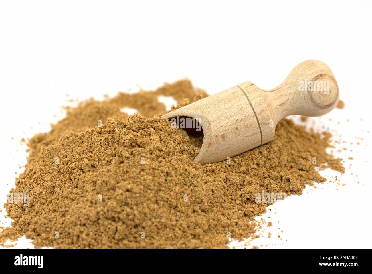 Rosehip powder, spice scoop in front of white background Stock Photo ...