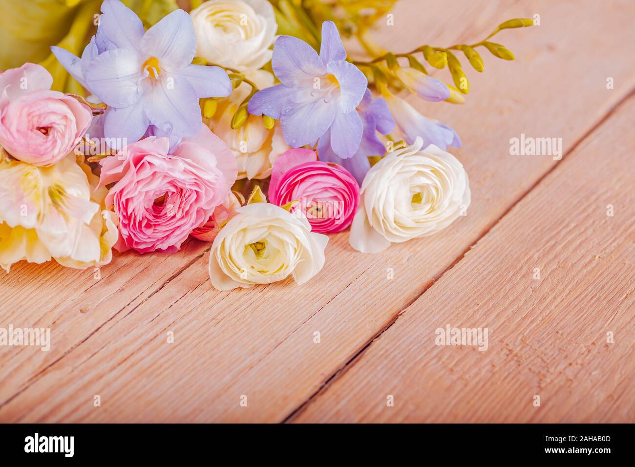 a bunch of freesias, tulips, ranunculus and hyacinths Stock Photo - Alamy