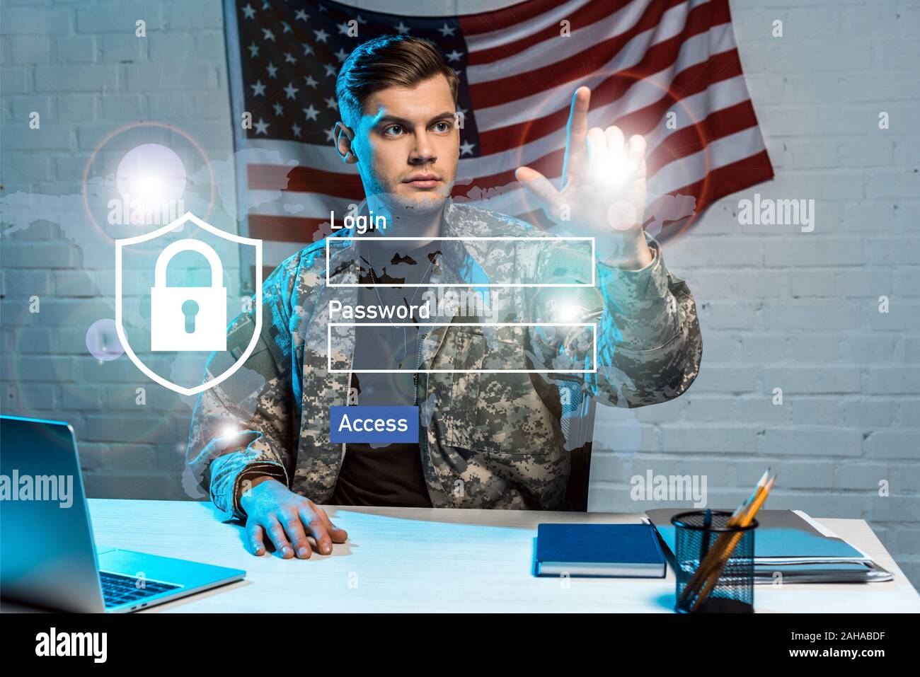 handsome soldier in uniform pointing with finger at login and password ...