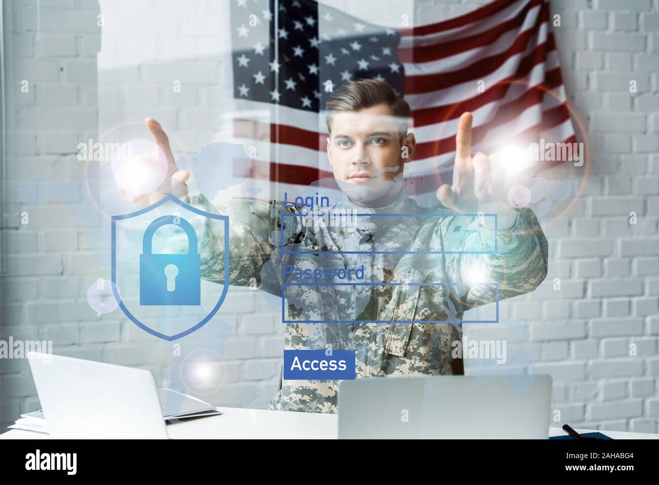 handsome soldier in military uniform pointing with fingers at virtual ...