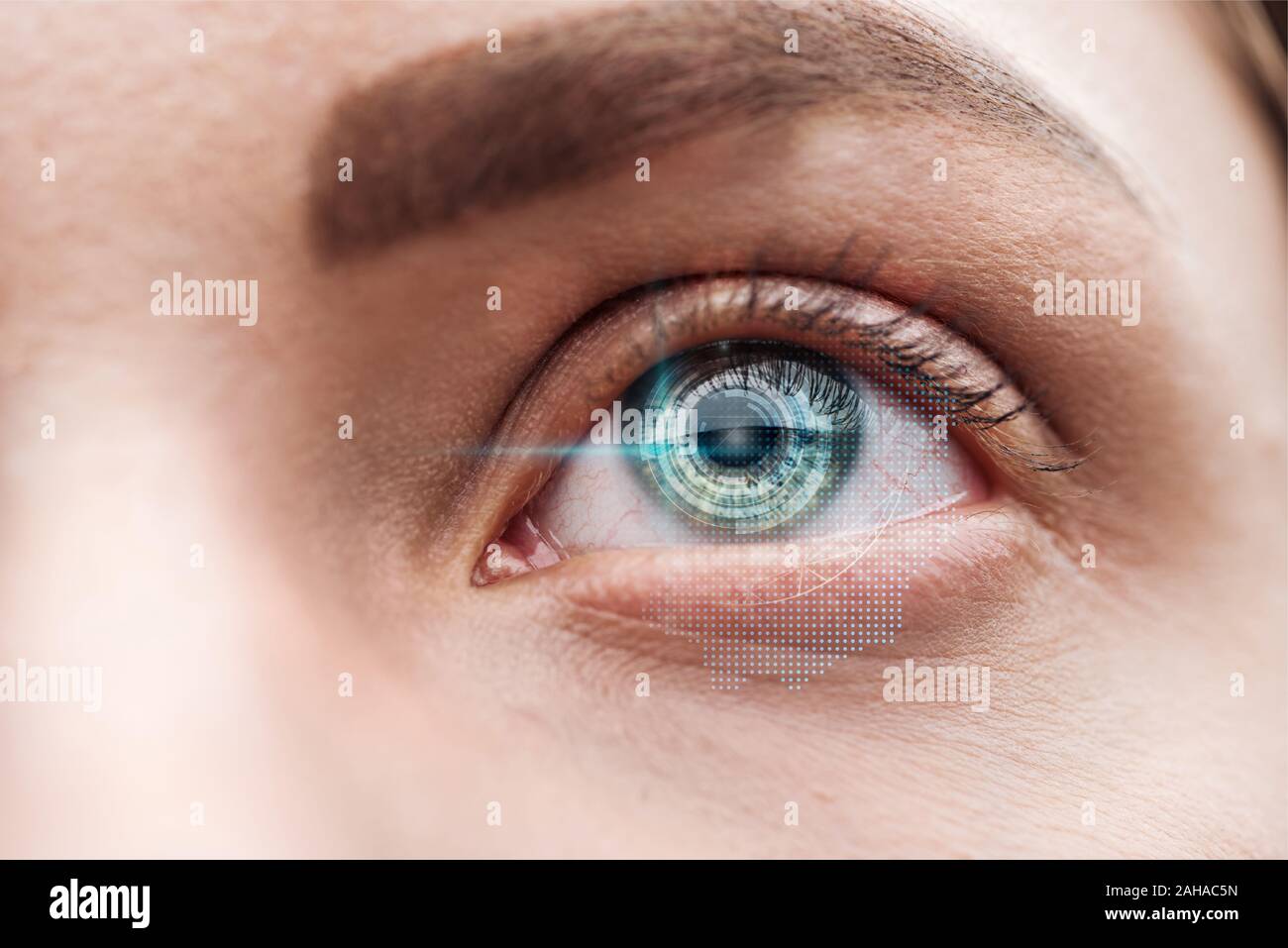 close up view of human green eye with data illustration, robotic ...