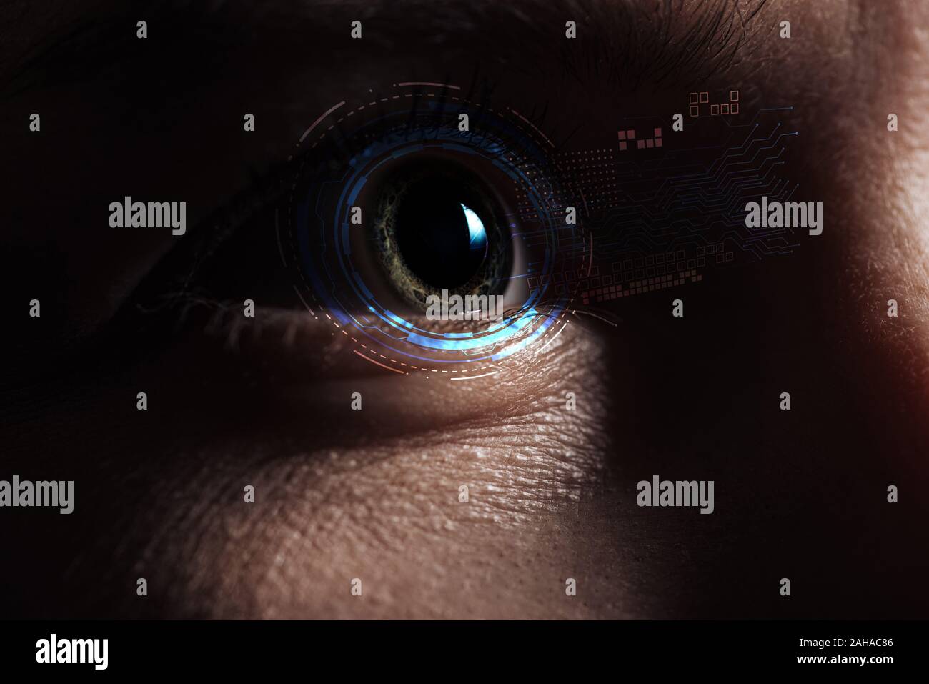 close up view of human eye with data illustration in darkness, robotic ...