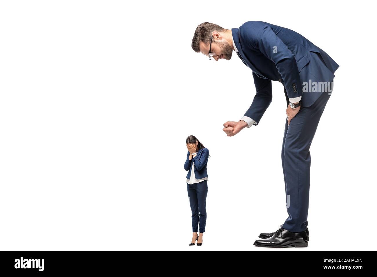 big businessman showing clenched fist at crying small businesswoman ...