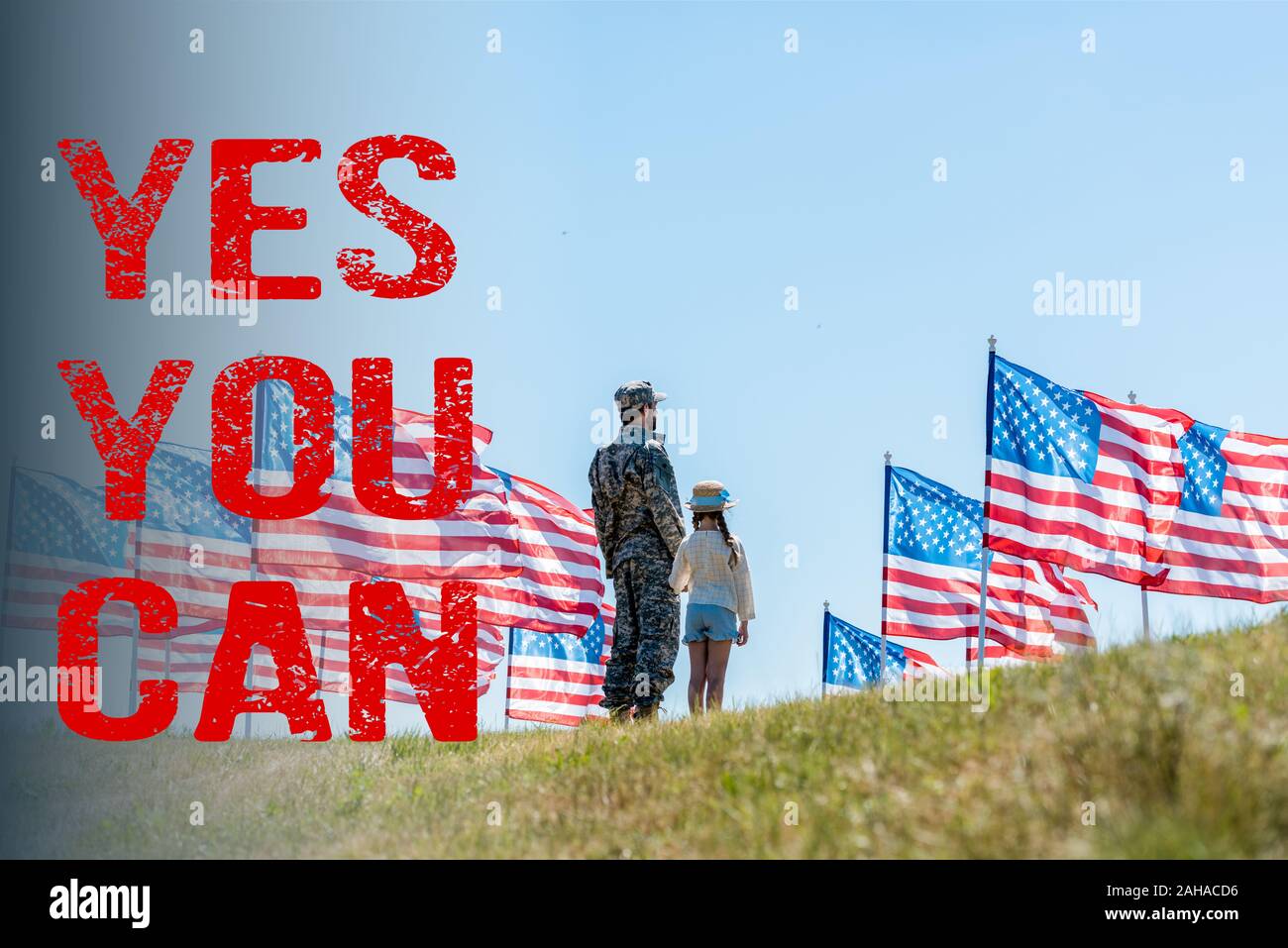man in military uniform standing with daughter near american flags with ...