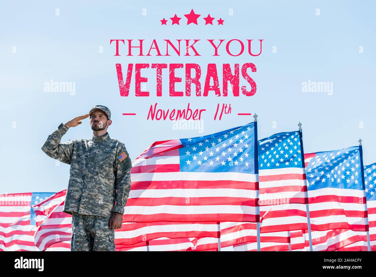 patriotic soldier in military uniform giving salute near american flags ...
