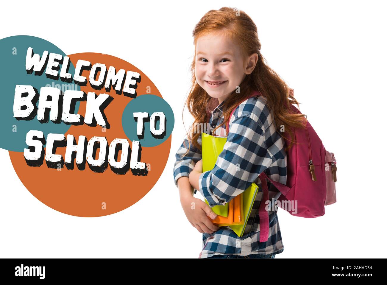 cheerful redhead pupil holding books near welcome back to school ...