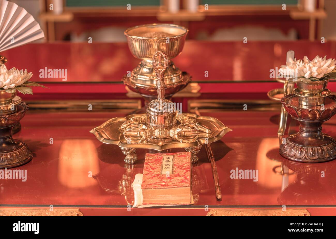 Prayer room of Gokokuji temple with sutra booklet, Gokorei bell and ...
