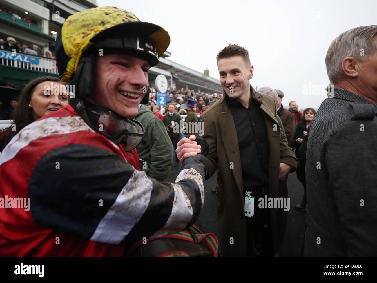 Part owner Jonathan Davies congratulates Jack Tudor after his victory ...