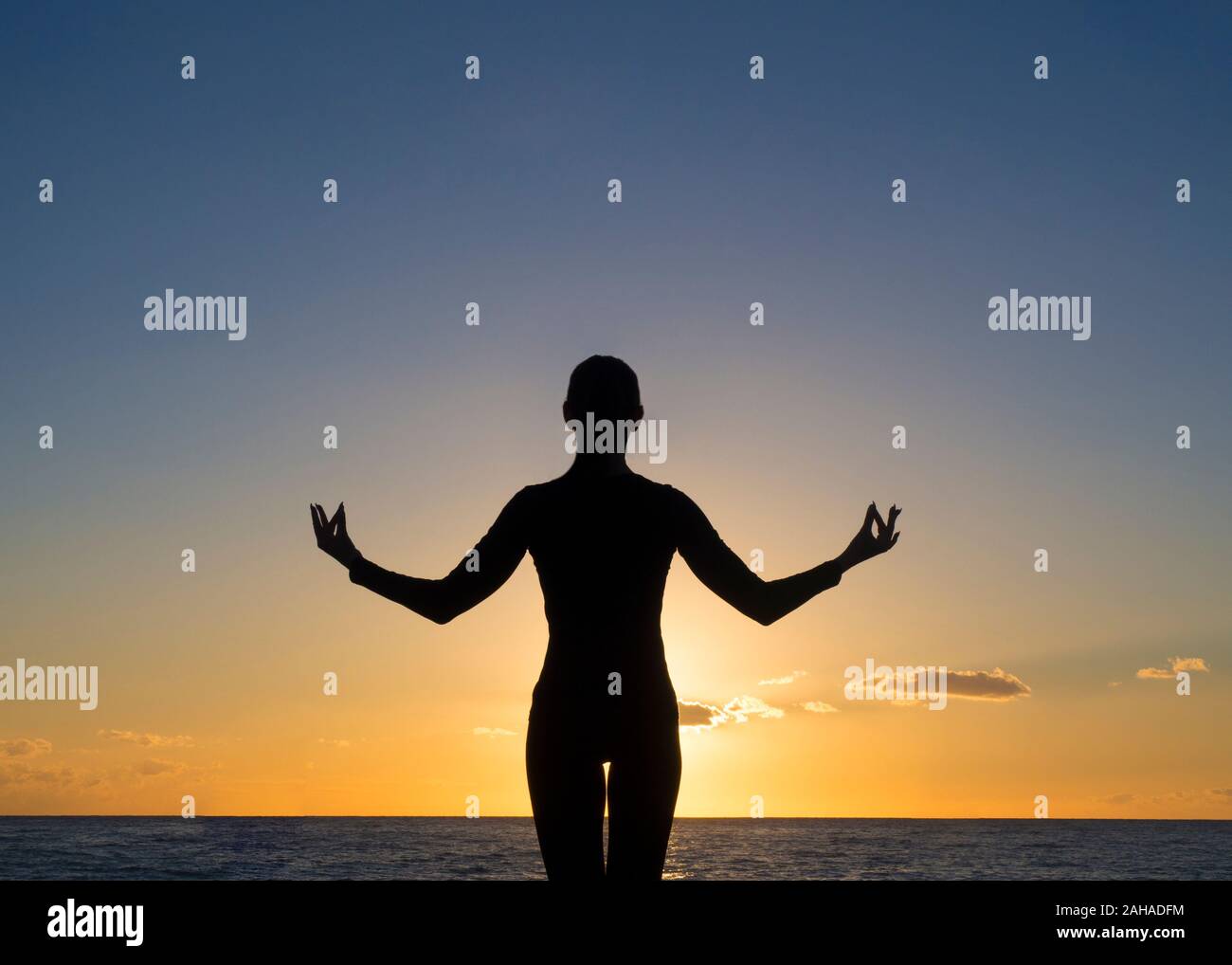 Woman In Peaceful Warrior Pose High Resolution Stock Photography and ...
