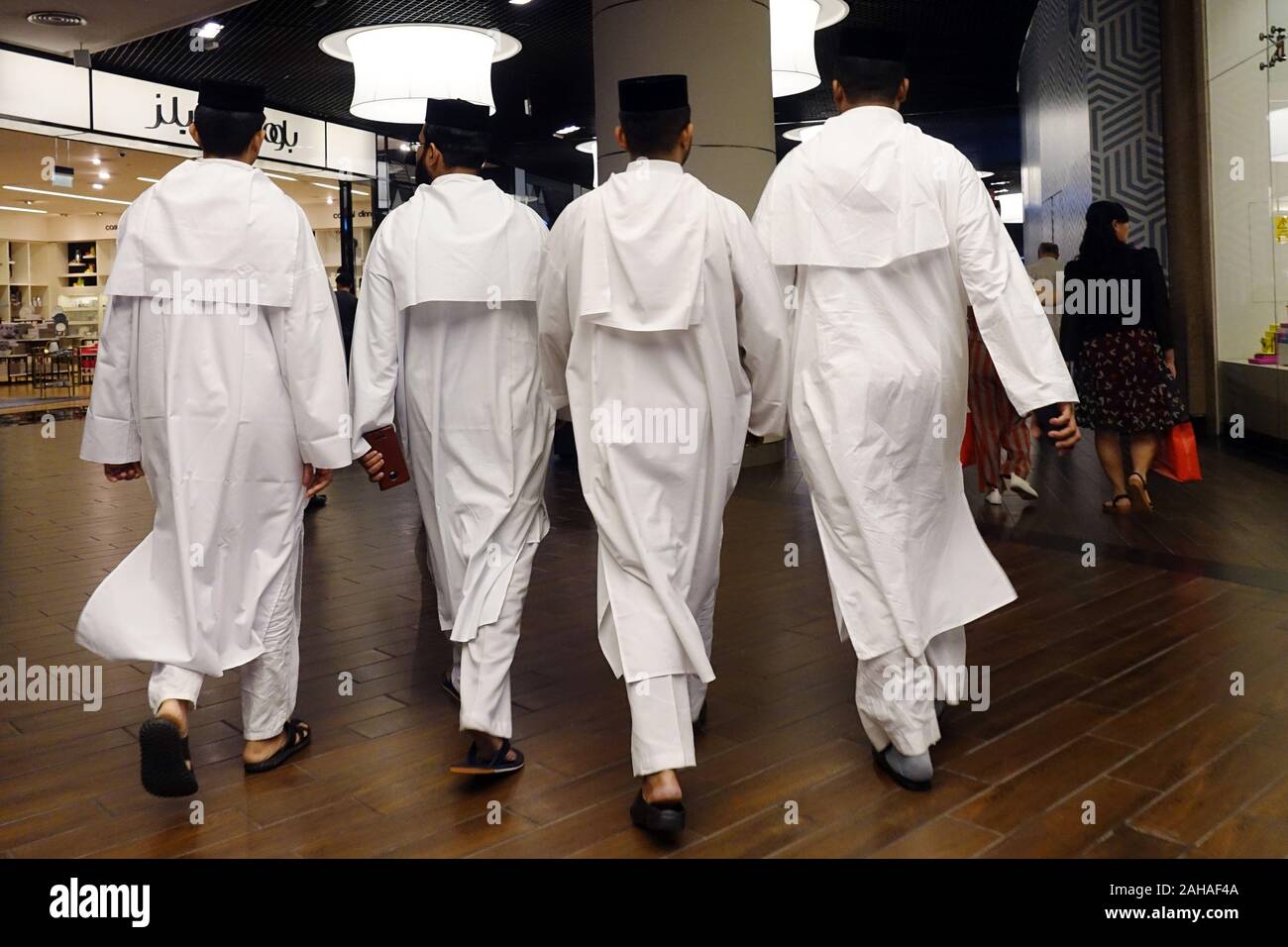 27.03.2018, Dubai, , United Arab Emirates - Men in traditional clothing ...