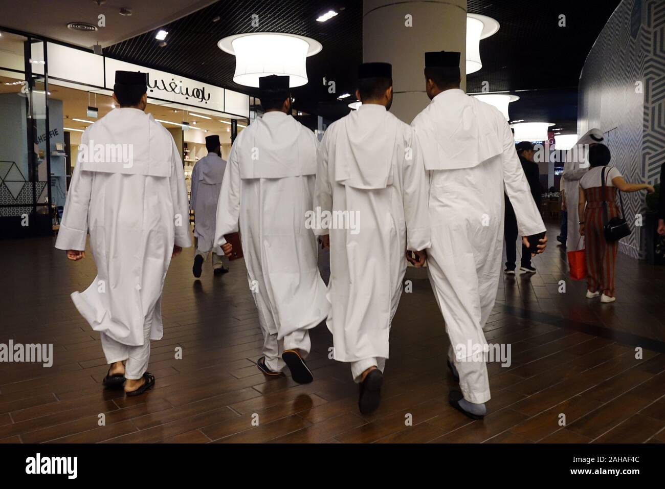 27.03.2018, Dubai, , United Arab Emirates - Men in traditional clothes ...