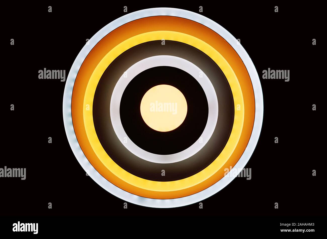 Round LED lamp with multi-colored glow. LED lighting in the interior ...