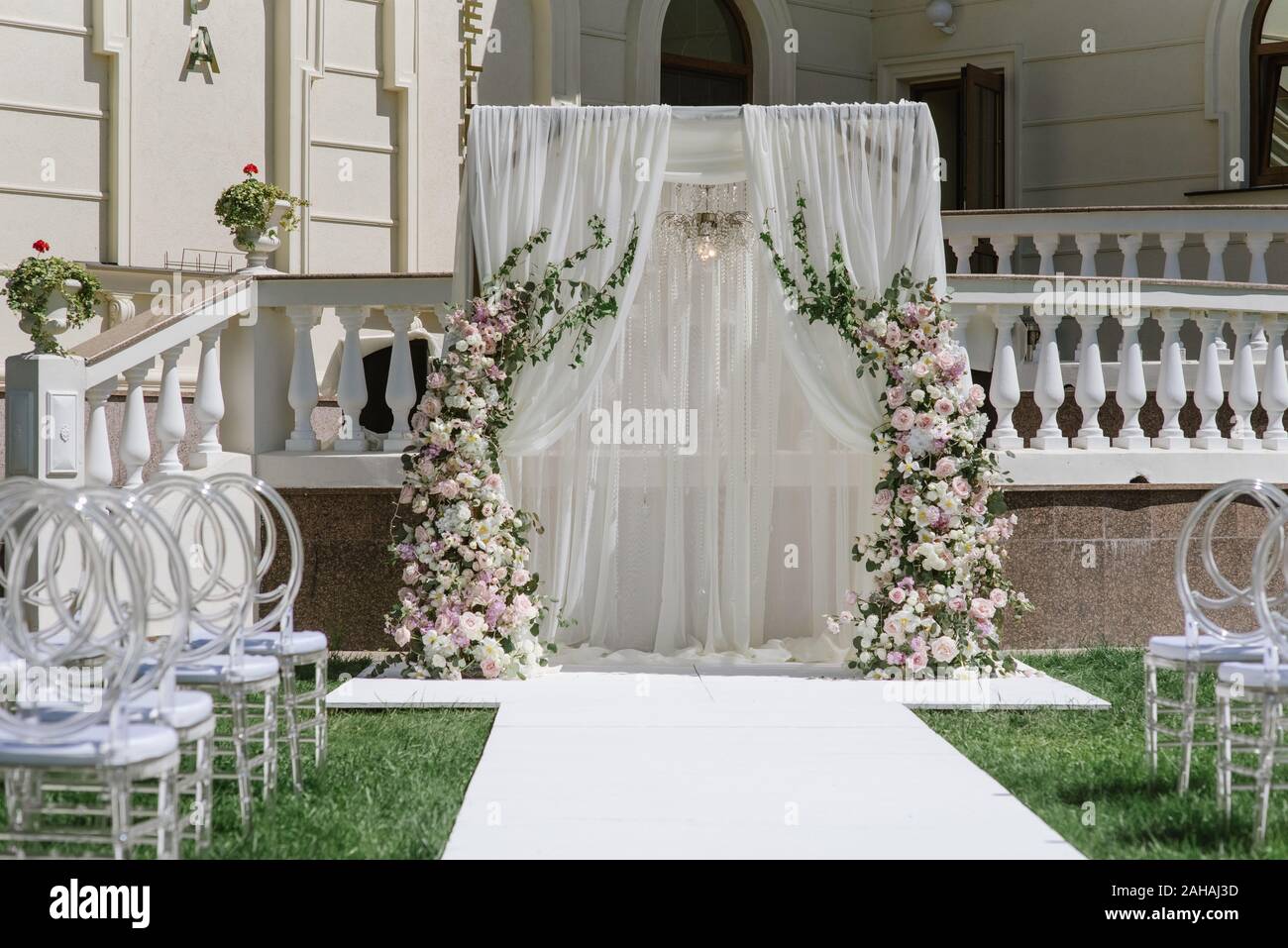 A large rectangular arch adorns the area for the marriage ceremony ...