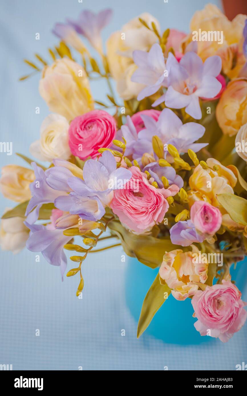 a bunch of freesias, tulips, ranunculus and hyacinths Stock Photo - Alamy