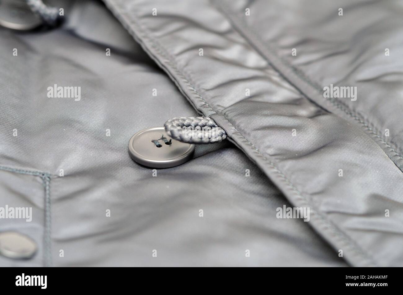 Detail of a winter fur jacket. Buttonhole and buttonhole Stock Photo ...