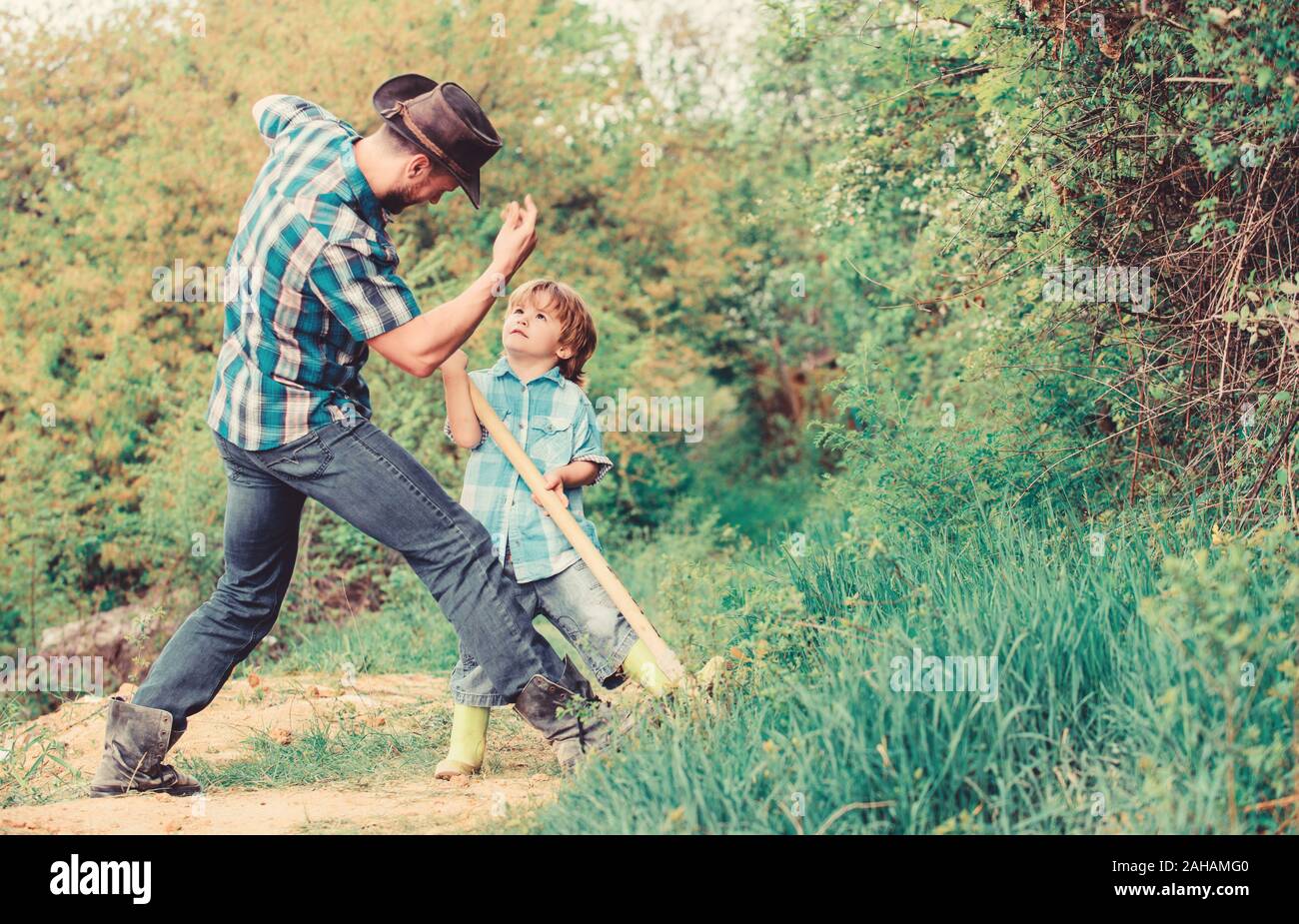 Adventure hunting for treasures. Little helper in garden. Cute child in ...