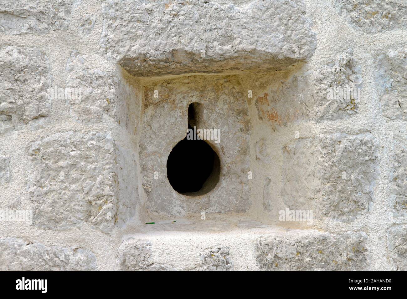 Loophole in wall at medieval castle fortification Stock Photo - Alamy