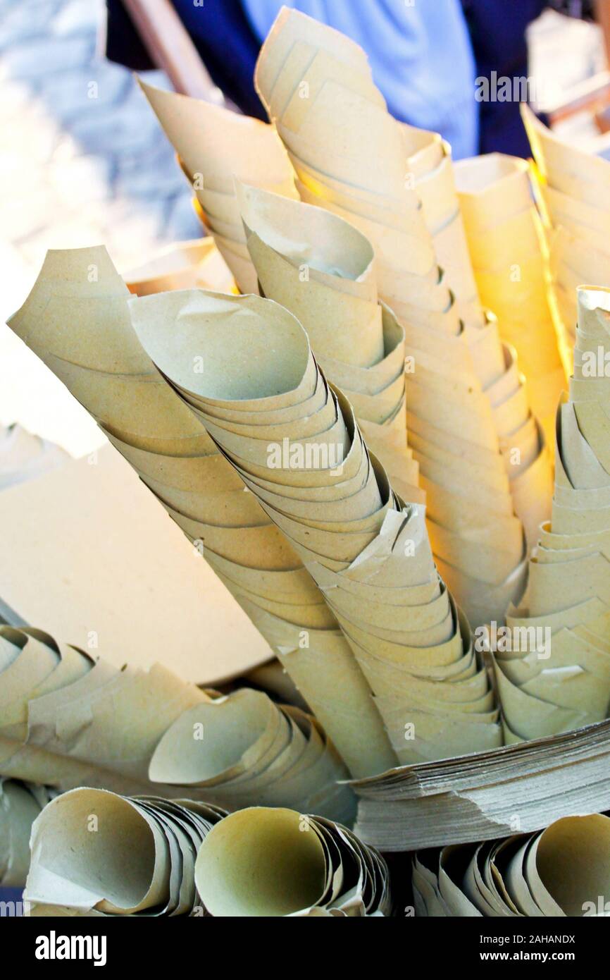 Big bunch of paper cones for packing Stock Photo - Alamy