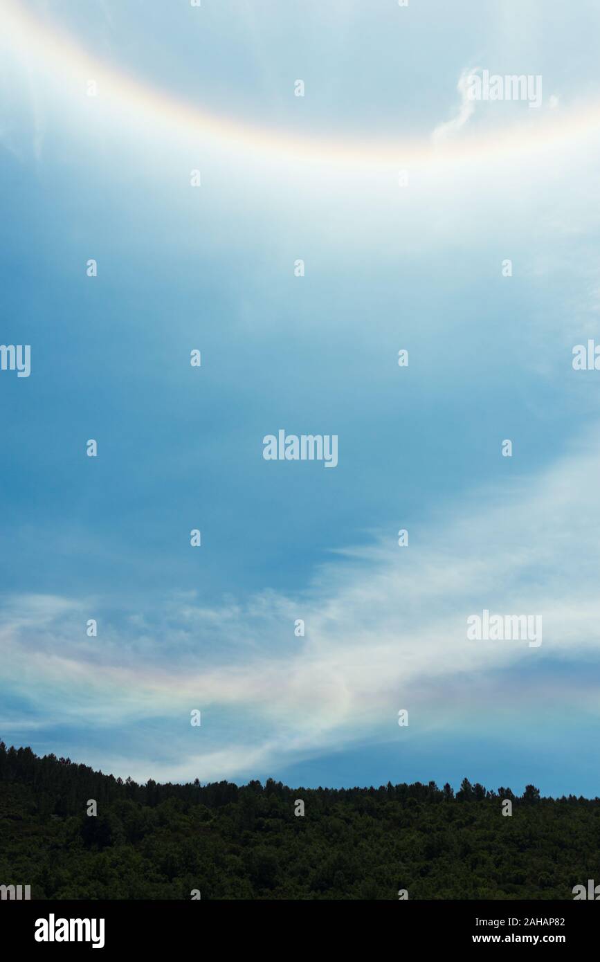 Part of Circular 22° halo (optical phenomenon Stock Photo - Alamy