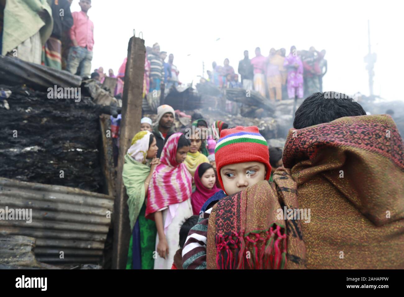 Dhaka, Bangladesh. 27th Dec, 2019. A fire ravaged over 100 shanties of ...