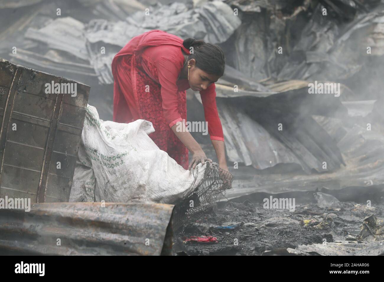 Dhaka, Bangladesh. 27th Dec, 2019. A fire ravaged over 100 shanties of ...
