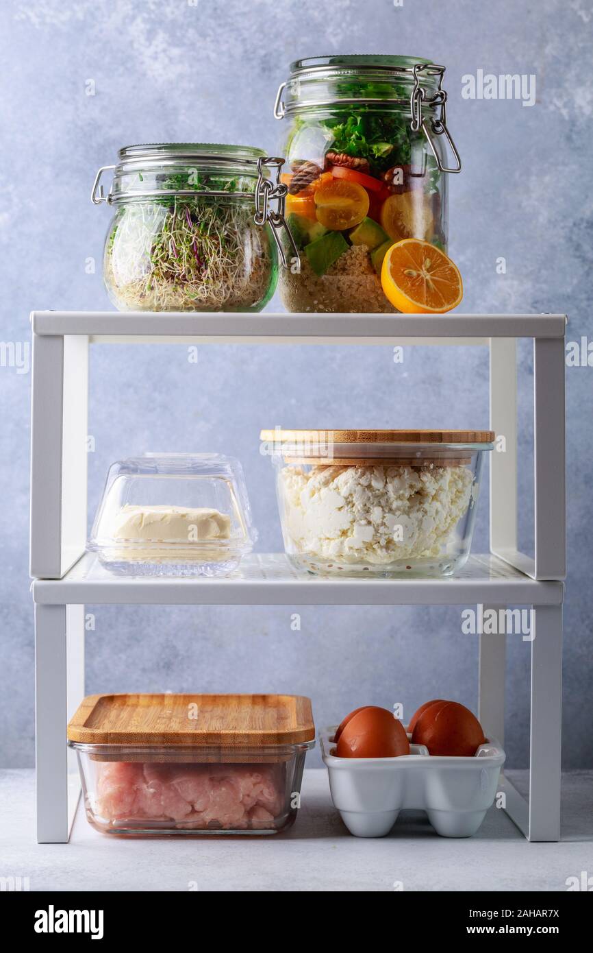 Glass boxes and cans with fresh food refrigerator storage concept ...