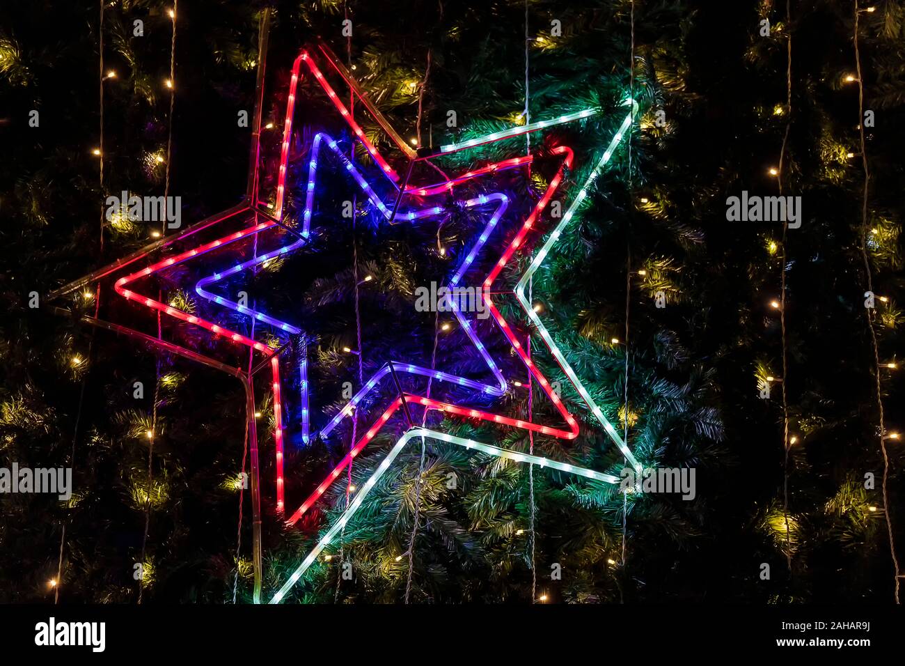 Green neon christmas tree star hi-res stock photography and images - Alamy