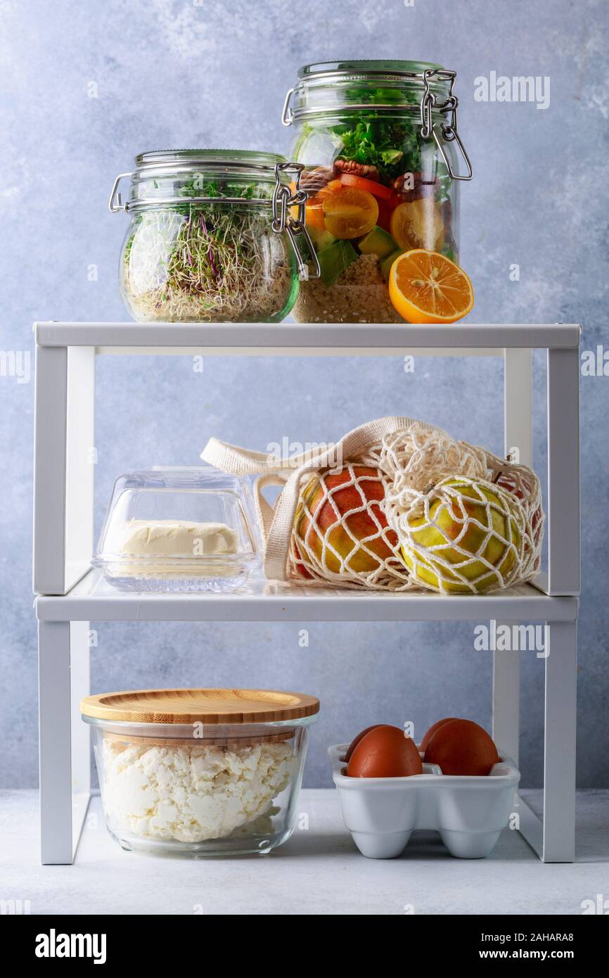 Glass boxes and cans with fresh food refrigerator storage concept ...