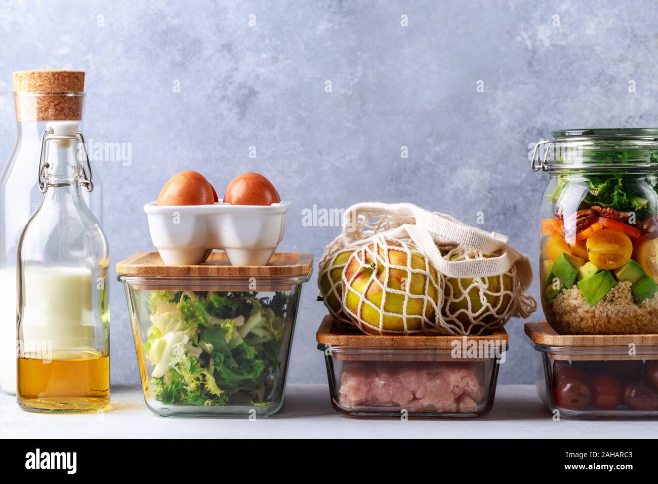 Glass boxes and cans with fresh food refrigerator storage concept ...