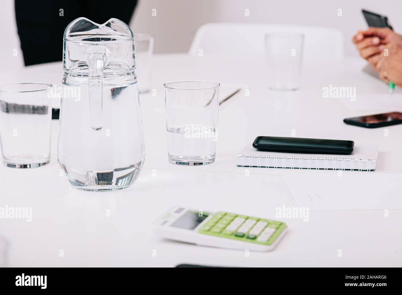 Closeup of calculator and hands over table in the office Stock Photo ...