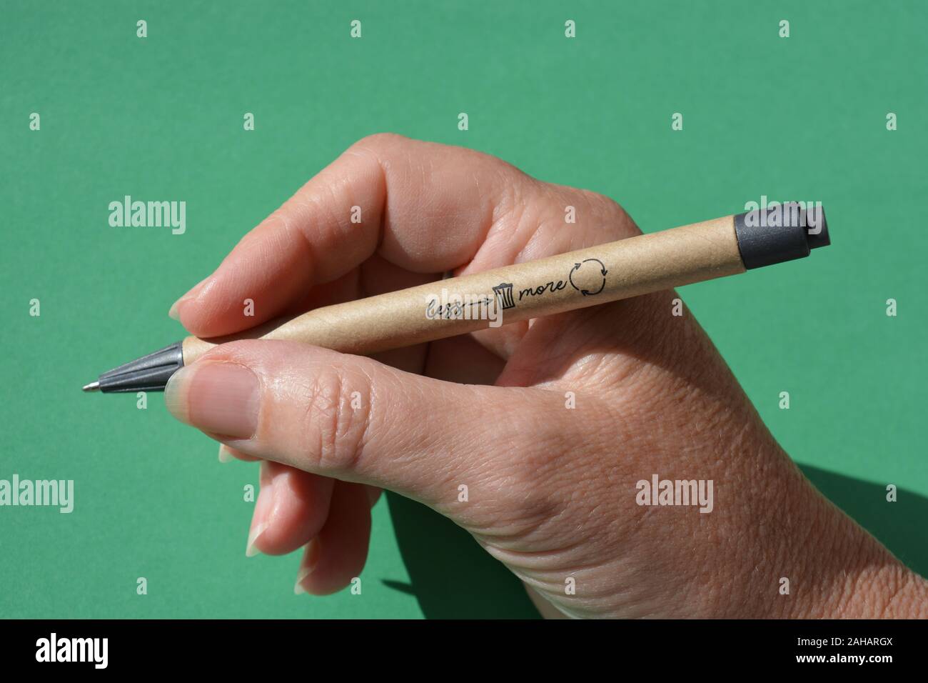 Less waste, More Recycling. Slogan with symbols on pen bought in Ale ...