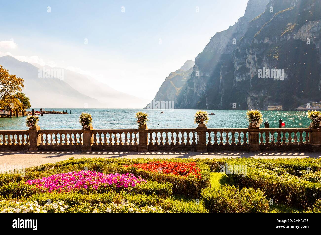 Garda lake promenade with colorful flowerbeds with growing and blooming ...