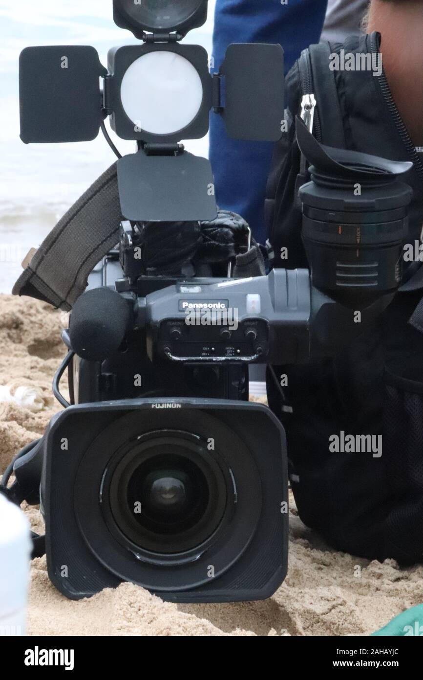 Camera in sand Stock Photo - Alamy