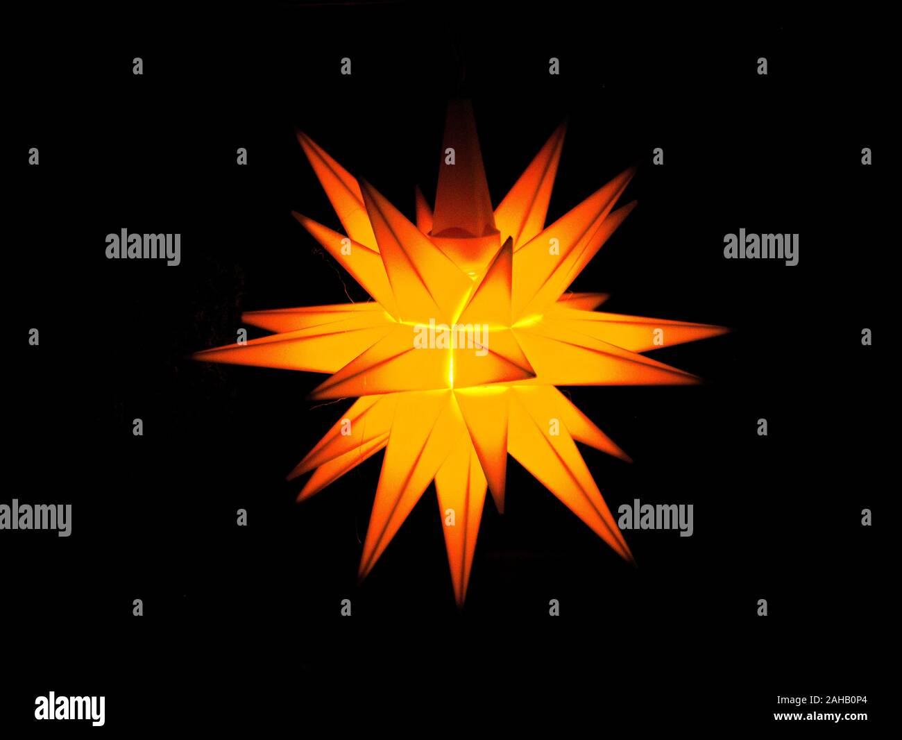 christmas star with light Stock Photo - Alamy