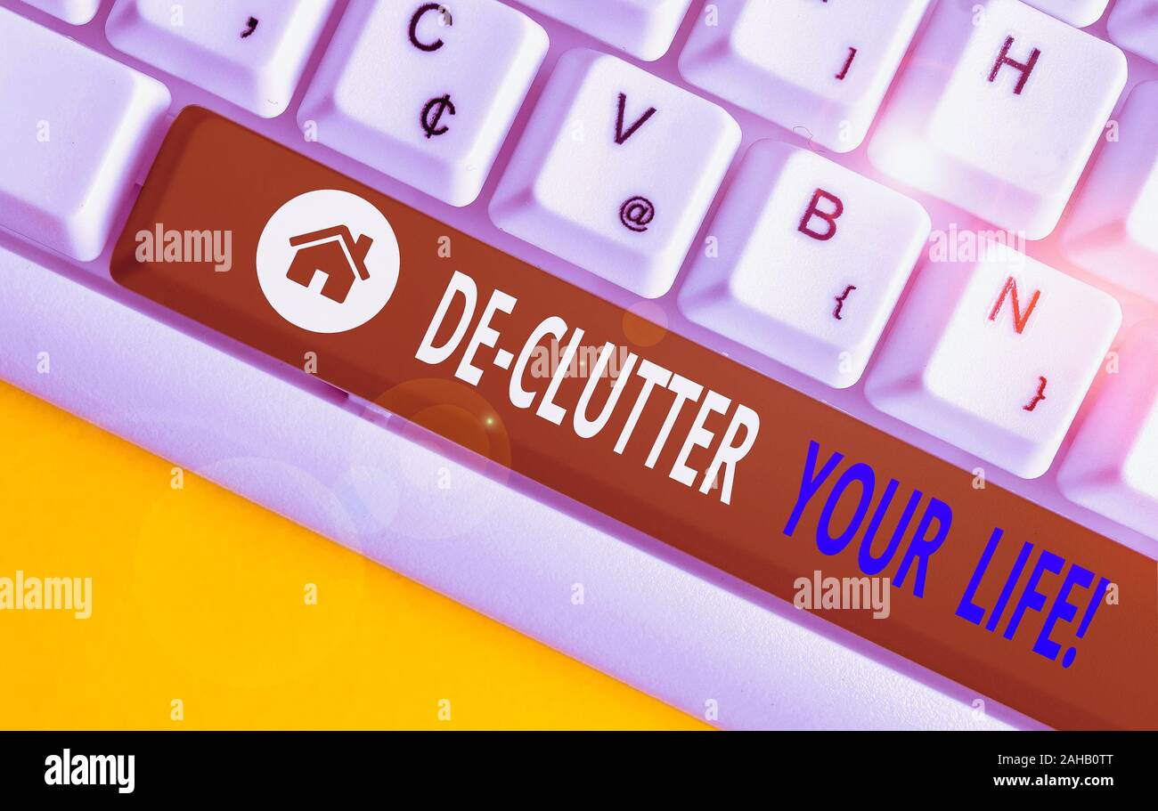 Writing note showing De Clutter Your Life. Business concept for remove ...