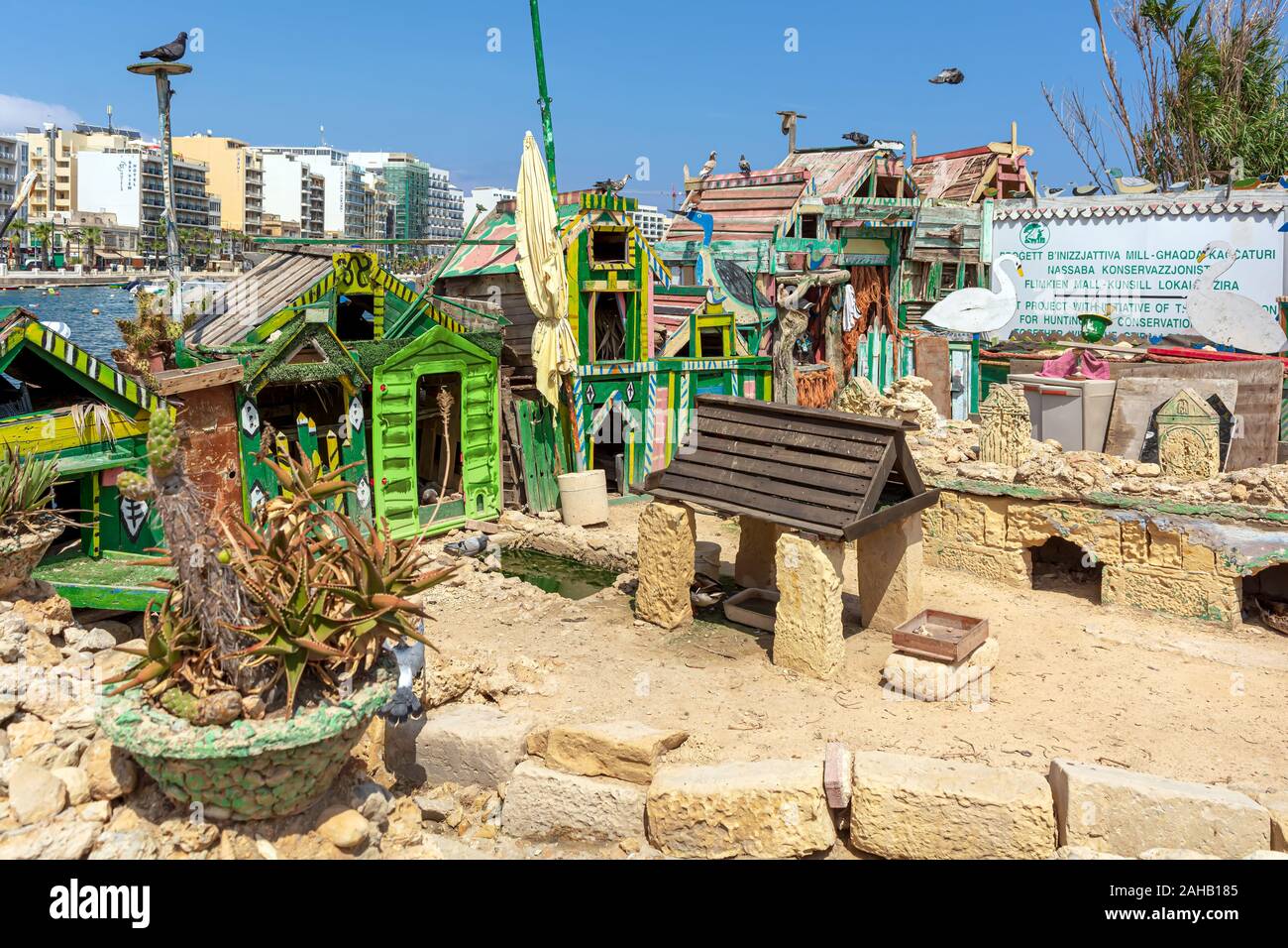 Colorful funky cabins and other structures in quirky Duck Village in ...