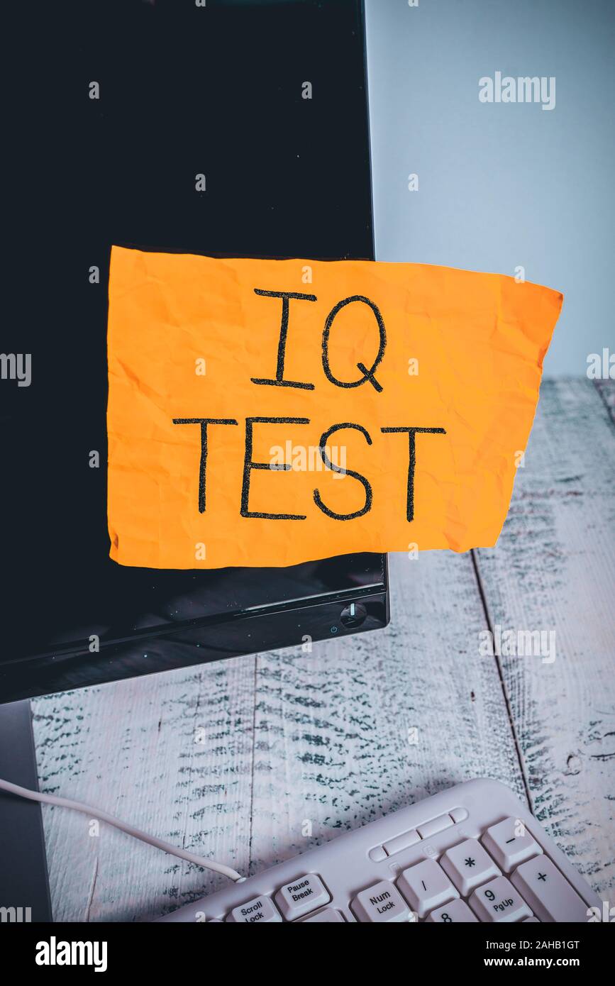 Writing note showing Iq Test. Business concept for attempt to measure ...