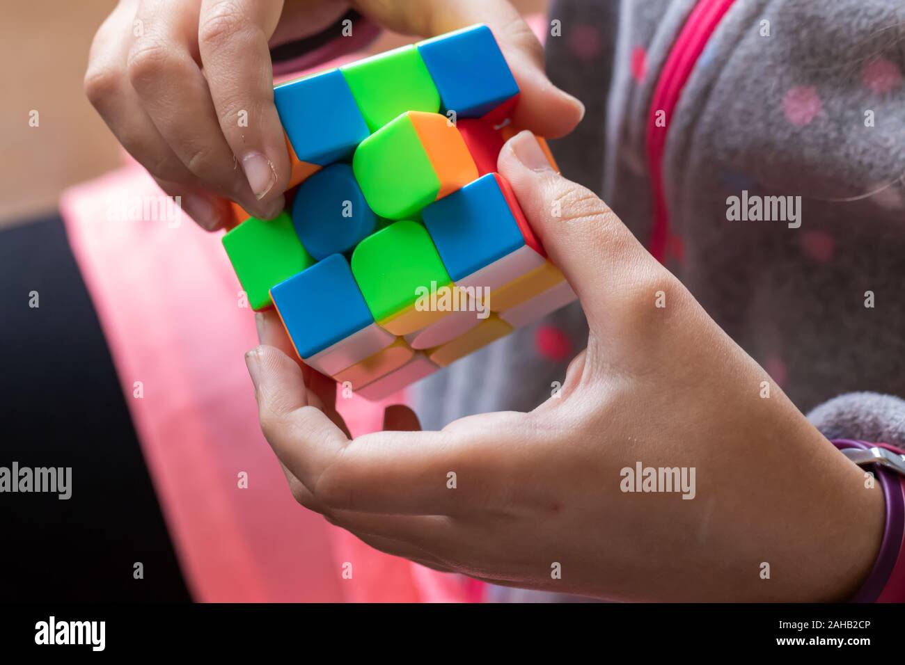 Colorful cube in children hands Stock Photo - Alamy