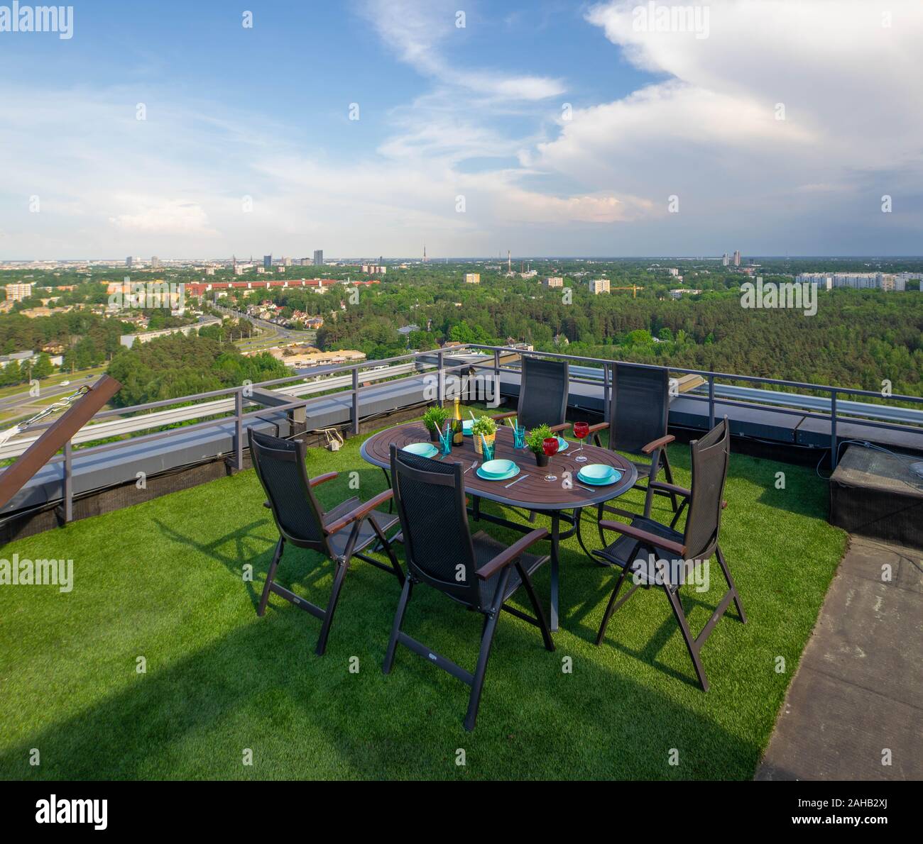 Table chairs on rooftop hi-res stock photography and images - Alamy